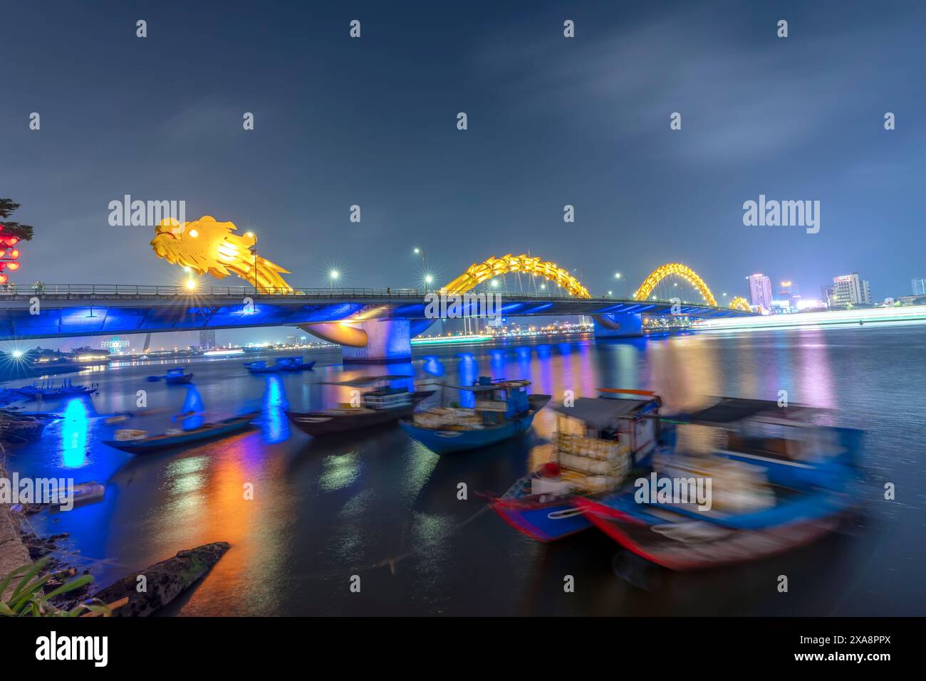 Dragon River Bridge and administrative center building at night, the ...