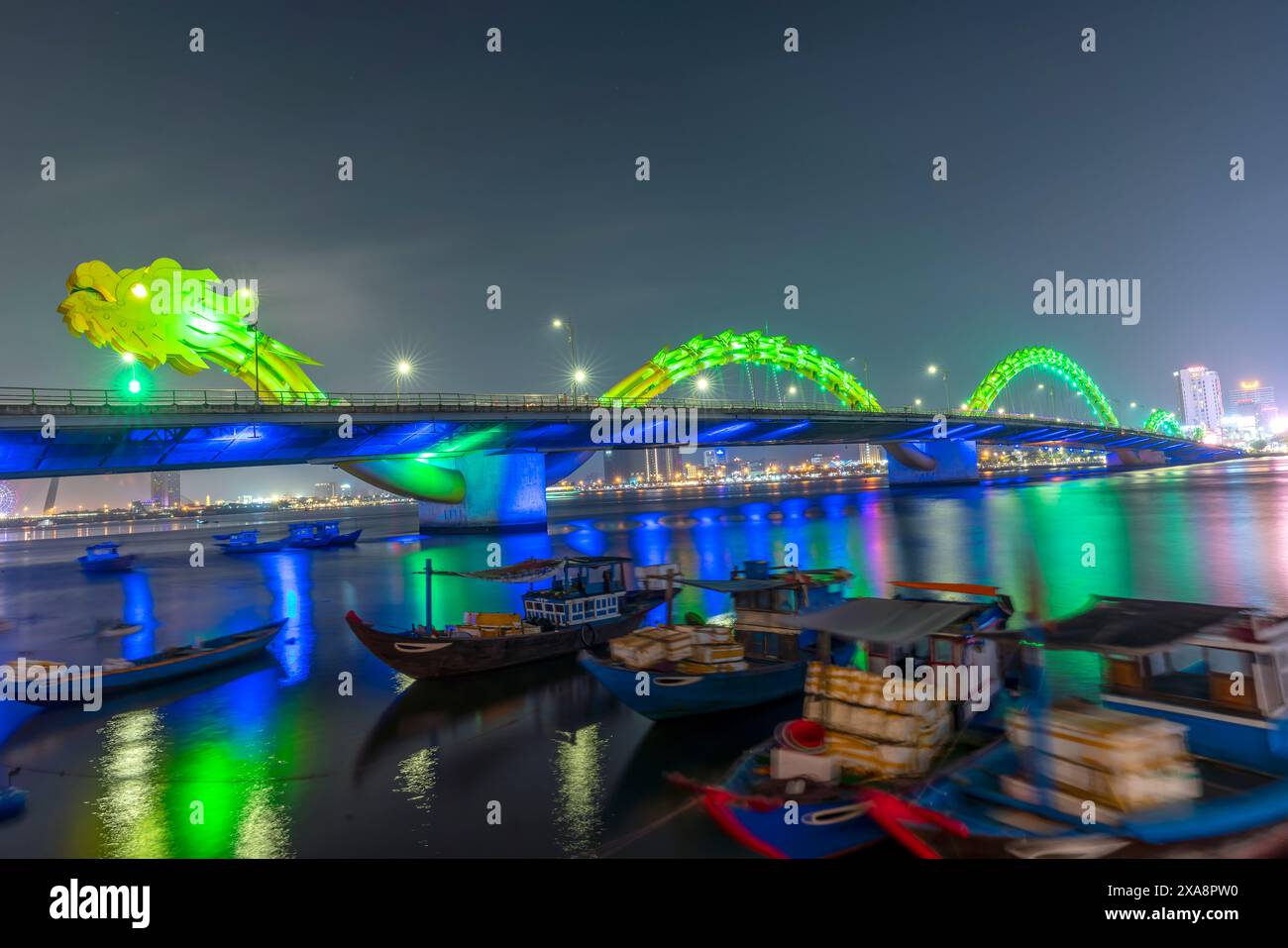 Dragon River Bridge and administrative center building at night, the ...