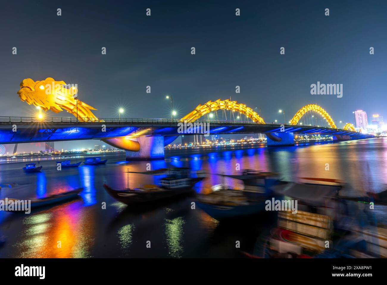Dragon River Bridge and administrative center building at night, the ...