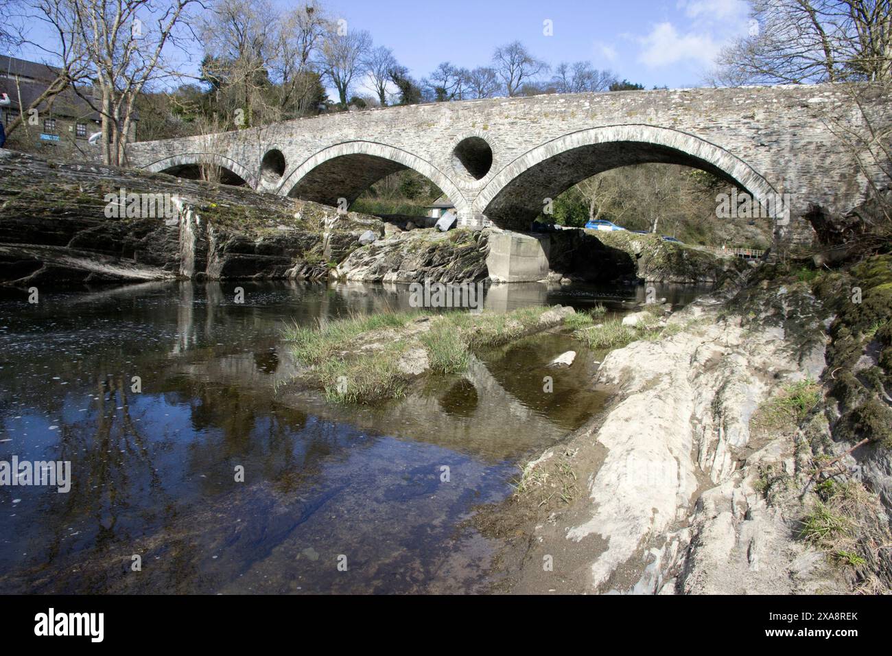 Cenarth Bridge is a single-carriageway three-arch rubble road bridge crossing the river Teifi ...