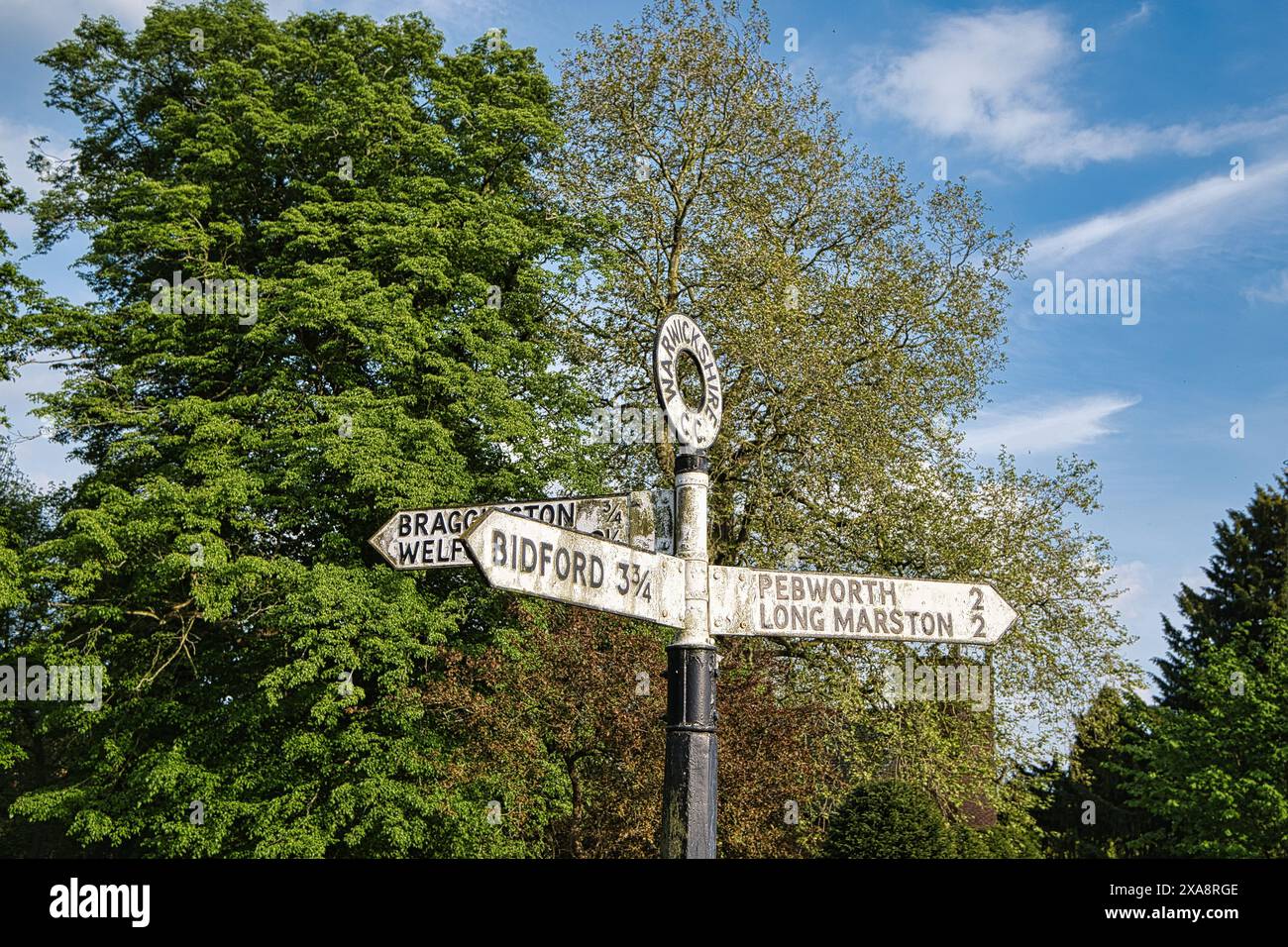 Traditional old signpost in the village of Dorsington, Warwickshire ...