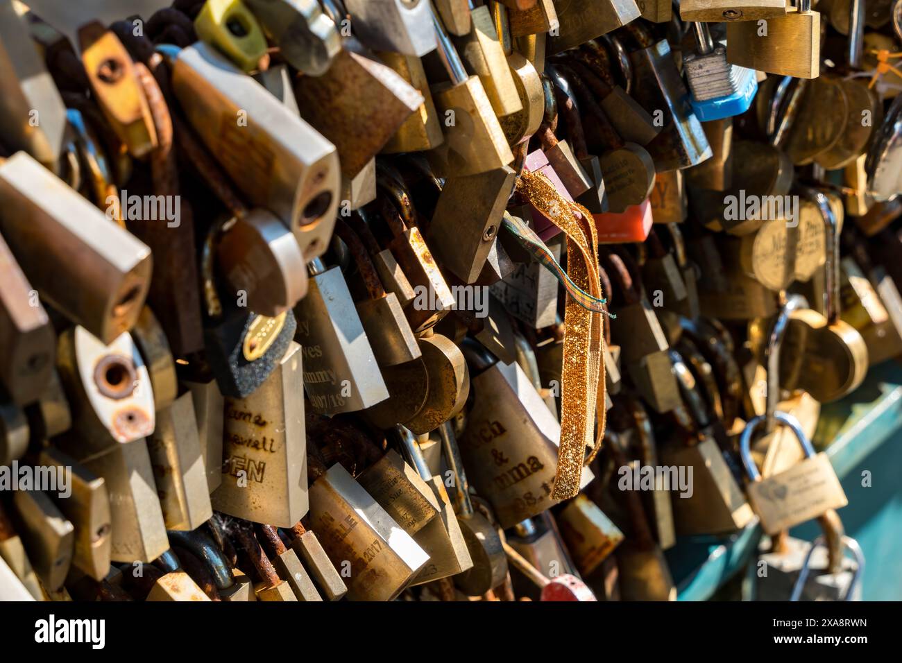 BAKEWELL, DERBYSHIRE, UK, MAY 19. Locks attached to the Old stone ...