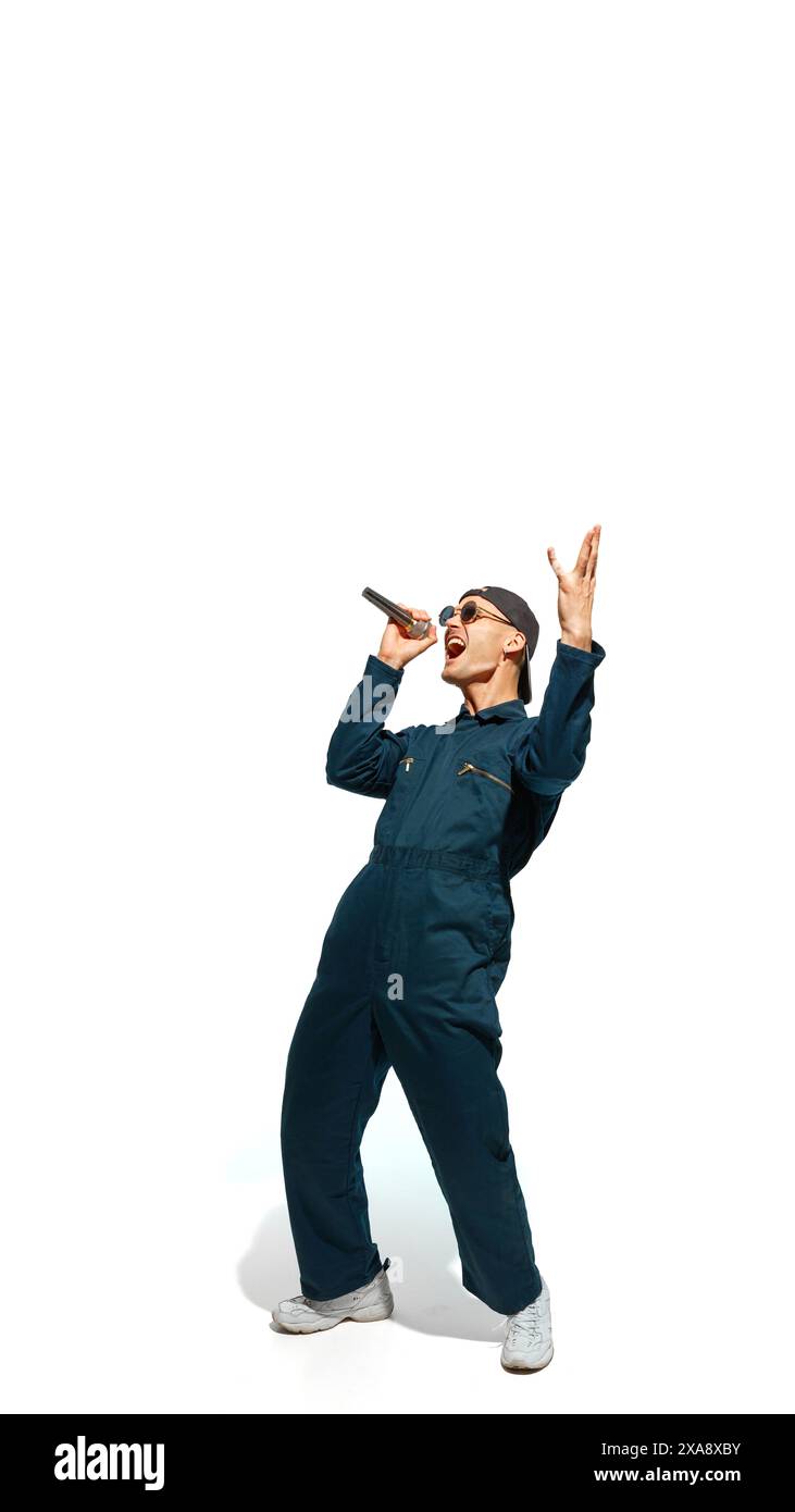Poster. Young man, musician wearing overalls with sunglasses singing ...