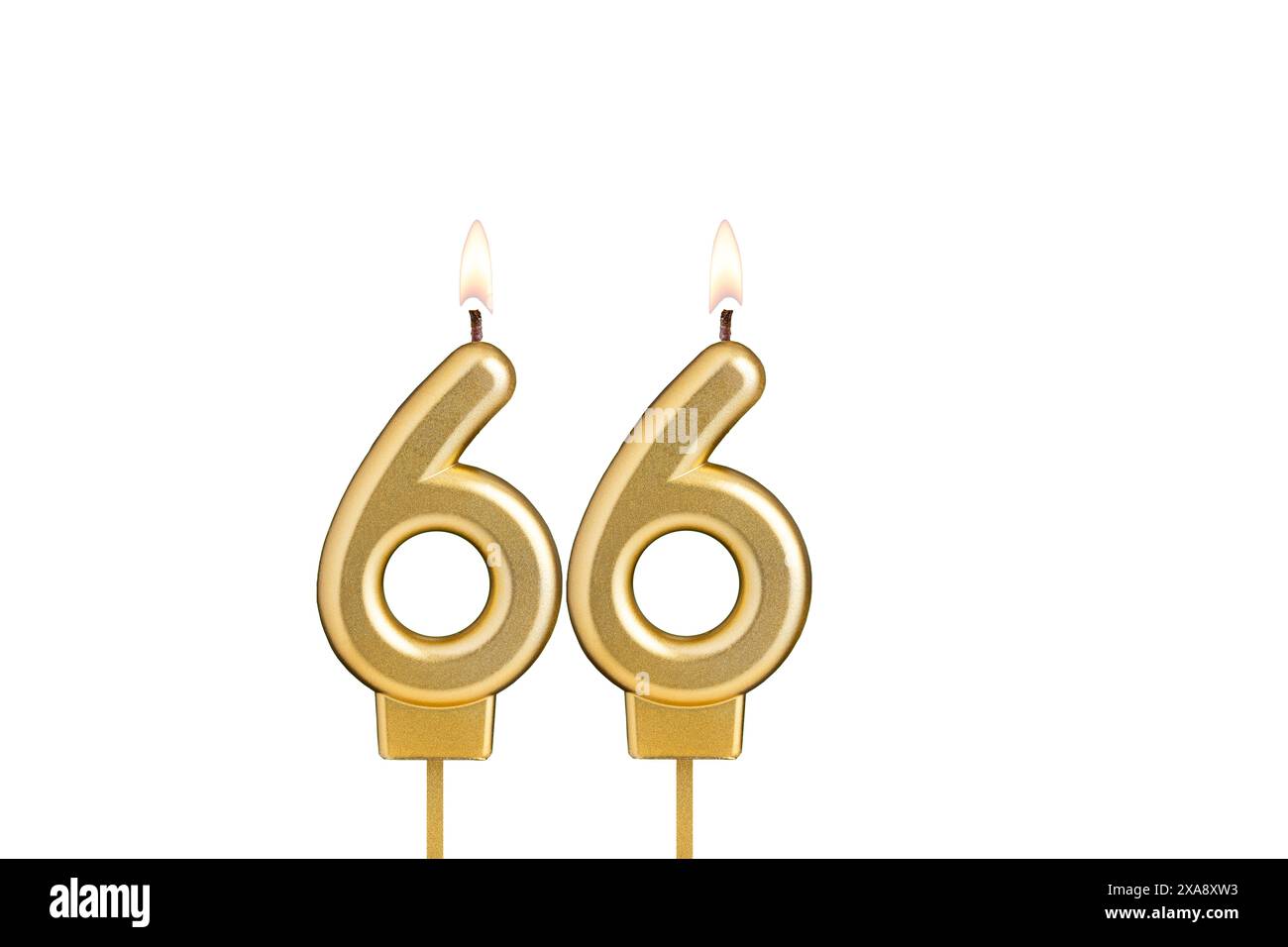 Golden number 66 birthday candle on white background Stock Photo - Alamy