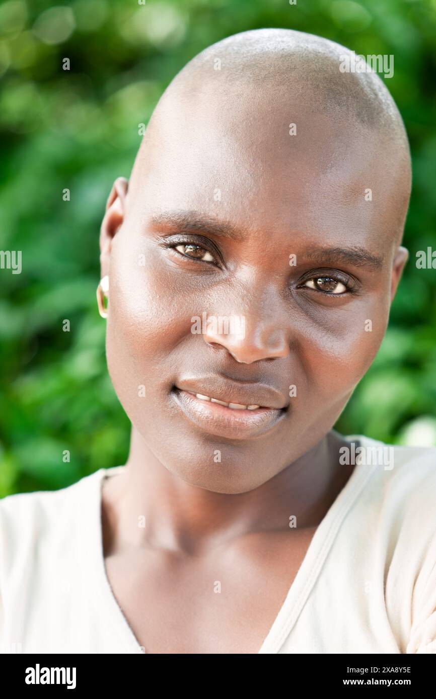single bald african young woman portrait Stock Photo - Alamy