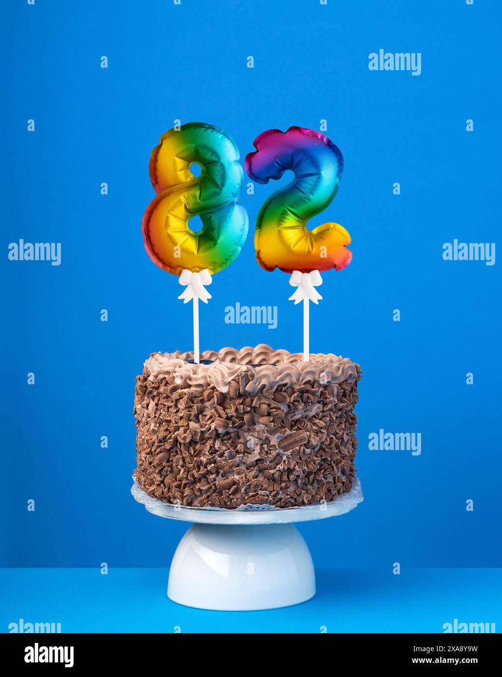 Birthday cake with balloon number 82 - Invitation card on blue ...