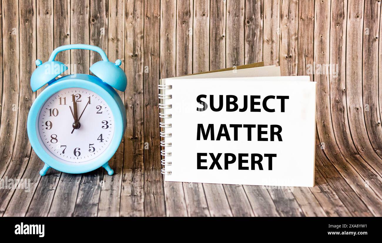 SME, subject matter expert symbol. Conceptual words on a notepad ...