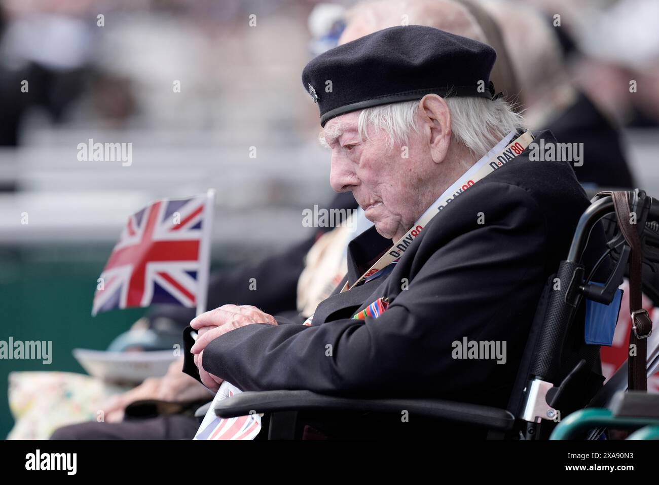 A Normandy veteran attends the UK's national commemorative event for ...