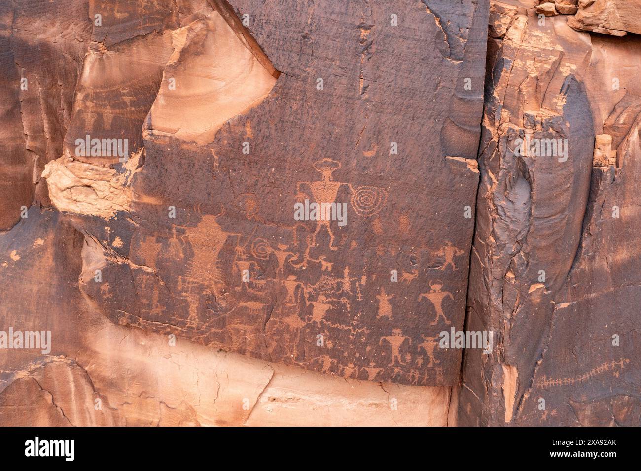 Prehistoric Fremont Culture petroglyphs depicting warriors, some with ...