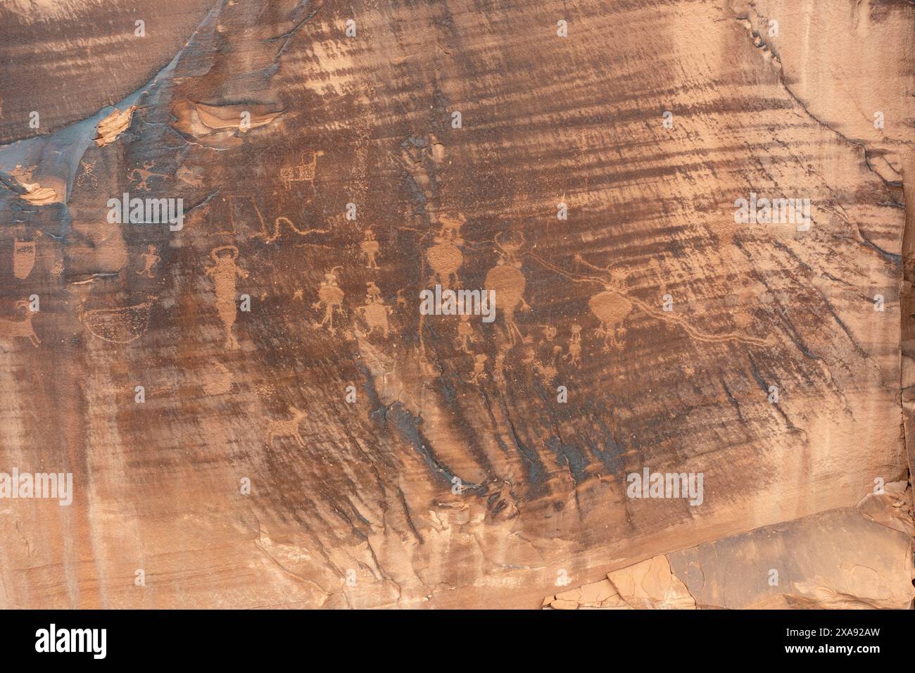 Prehistoric Fremont Culture petroglyphs depicting warriors with shields ...