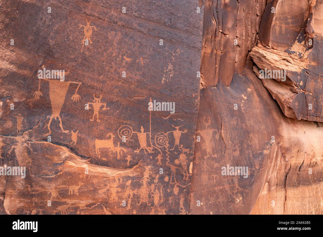 Prehistoric Fremont Culture petroglyphs depicting warriors, some with ...