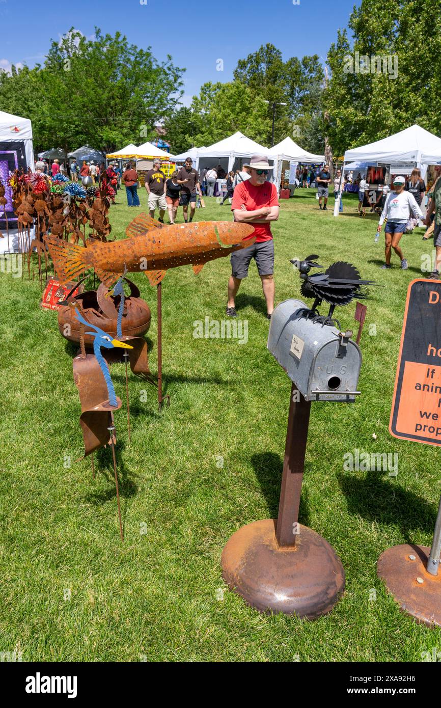 A display of whimsical metal yard art for sale at the annual Moab Arts ...