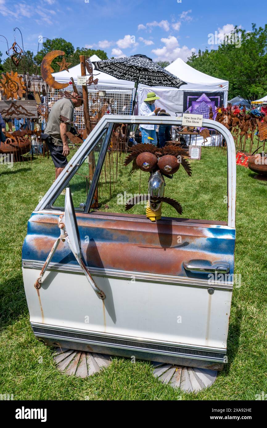 A display of whimsical metal yard art for sale at the annual Moab Arts ...