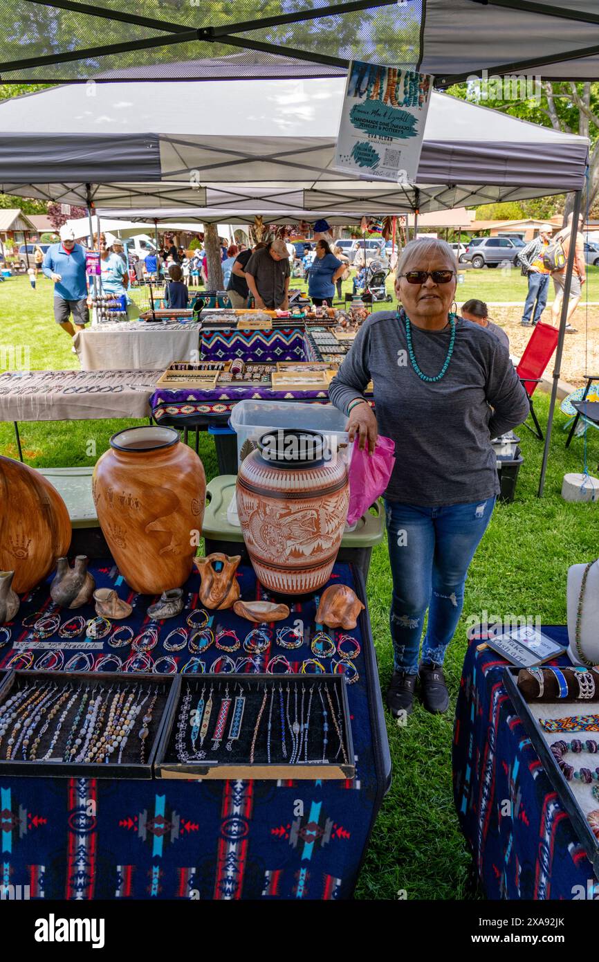 A Navajo woman selling her art and jewelry at the annual Moab Arts ...