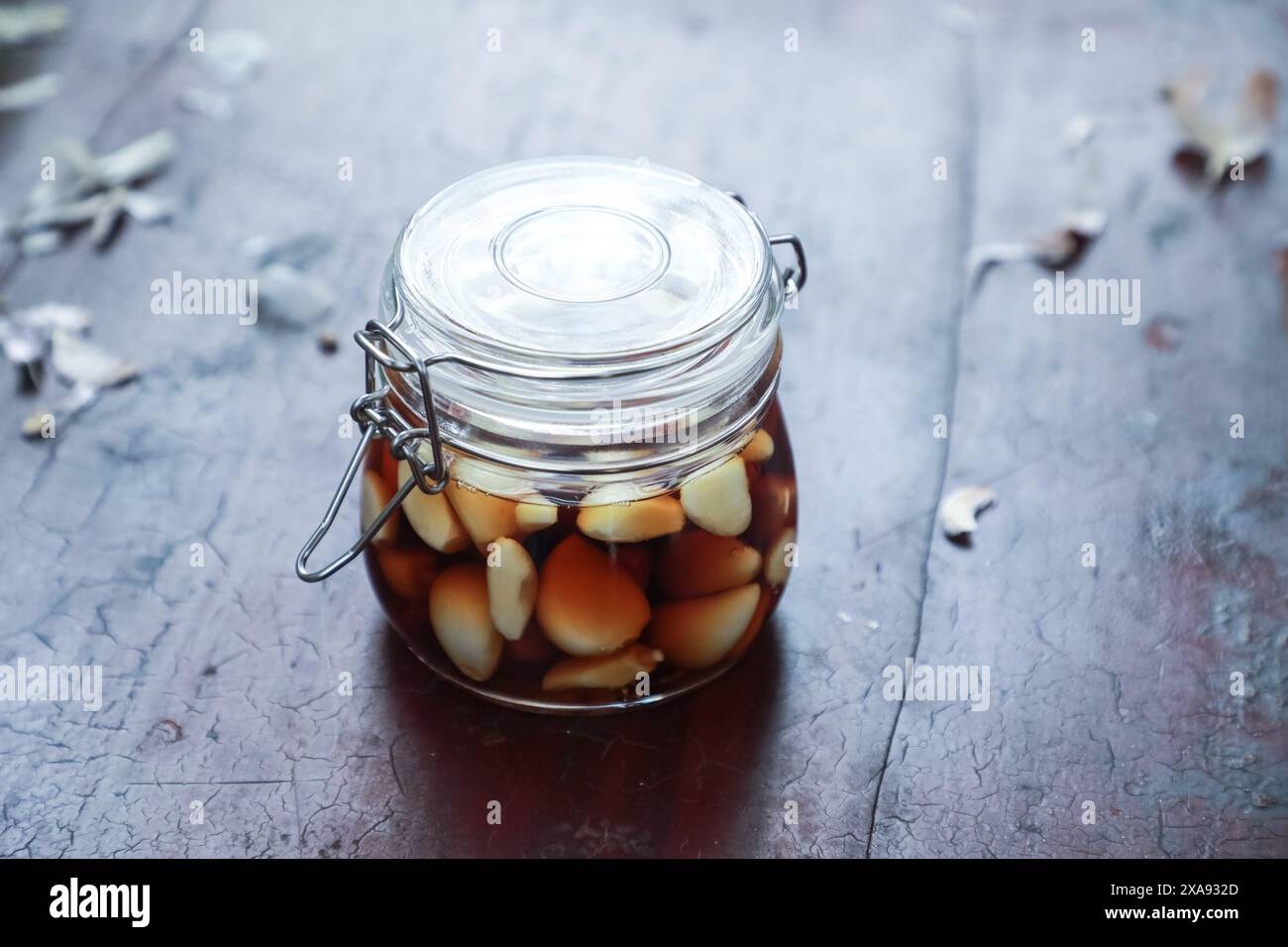 Laba garlic. Garlic pickled in vinegar with Rock sugar Stock Photo - Alamy