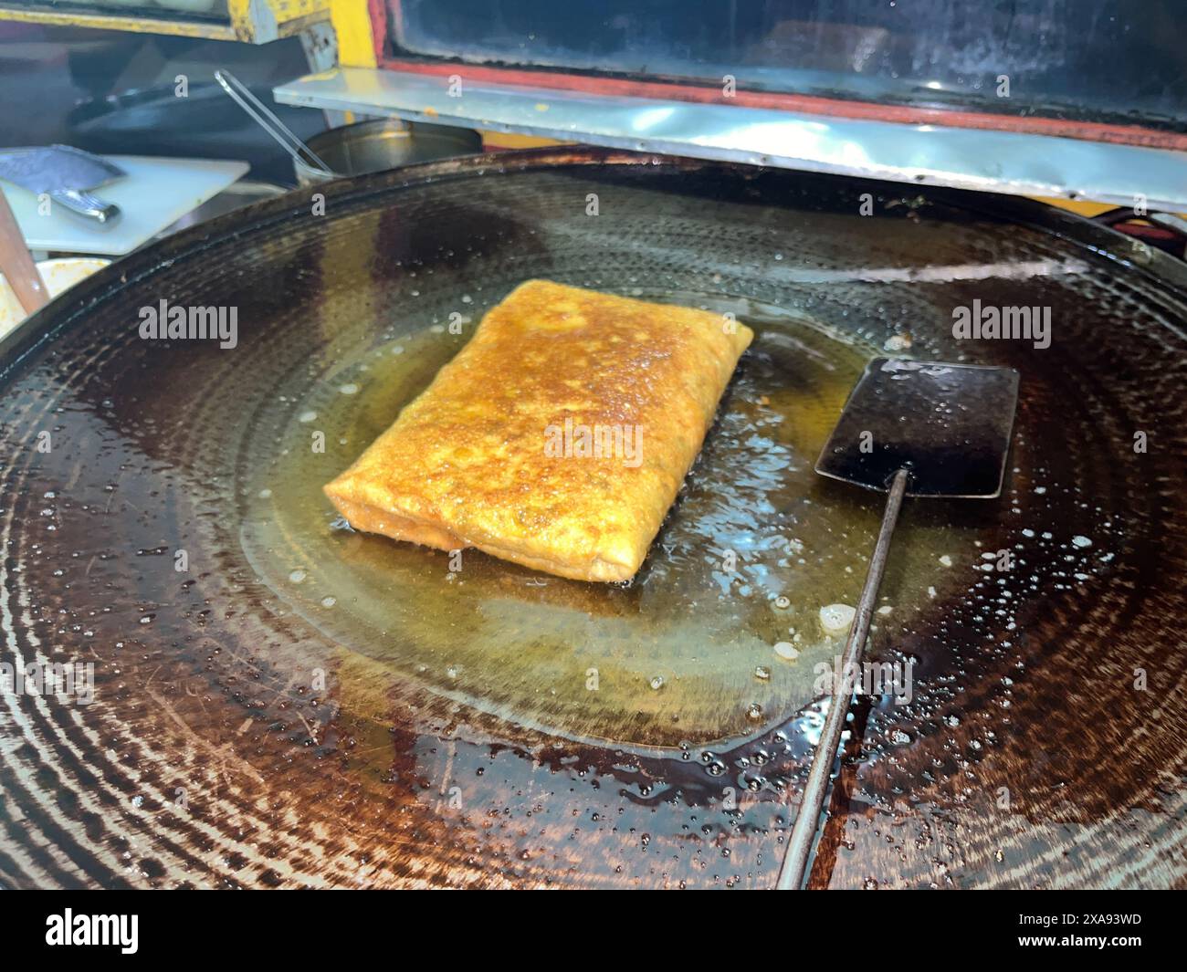 Martabak manis or terang bulan is indonesian sweet pancake, with yellow ...