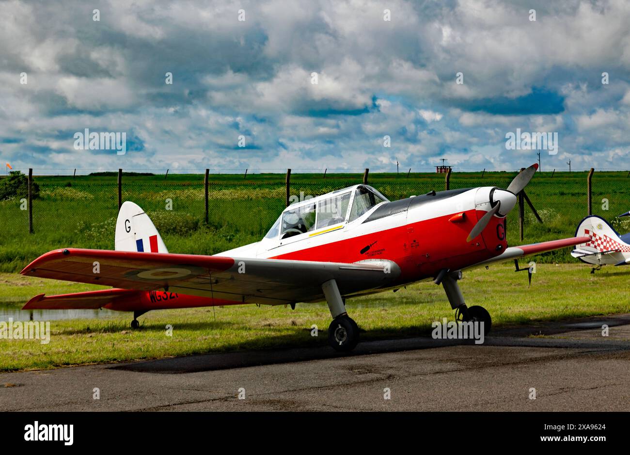 An Ex-RAF, DHC Chipmunk T10, parked-up at the Kent Strut charity fly-in ...