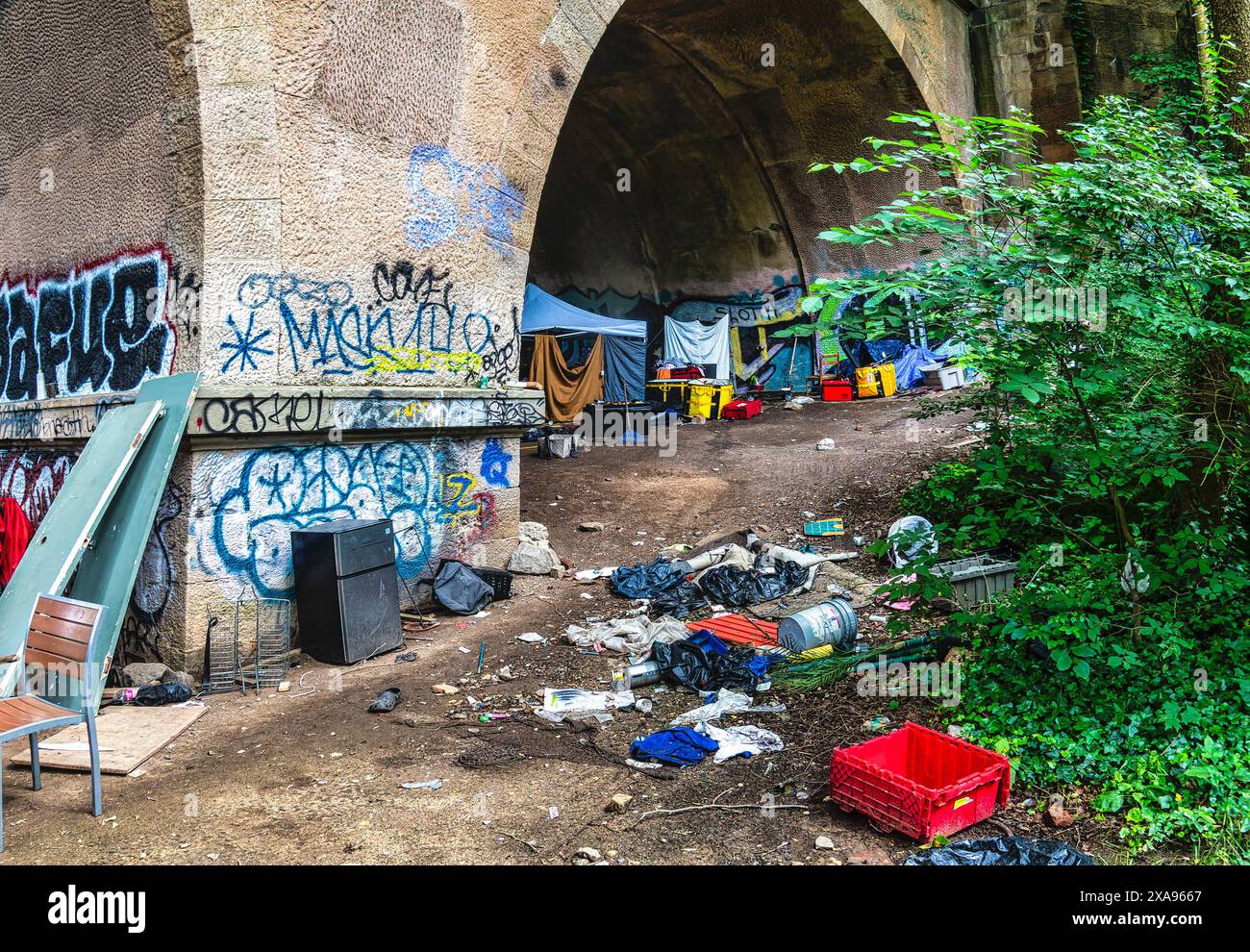 An abandoned homeless encampment under the P Street bridge in ...