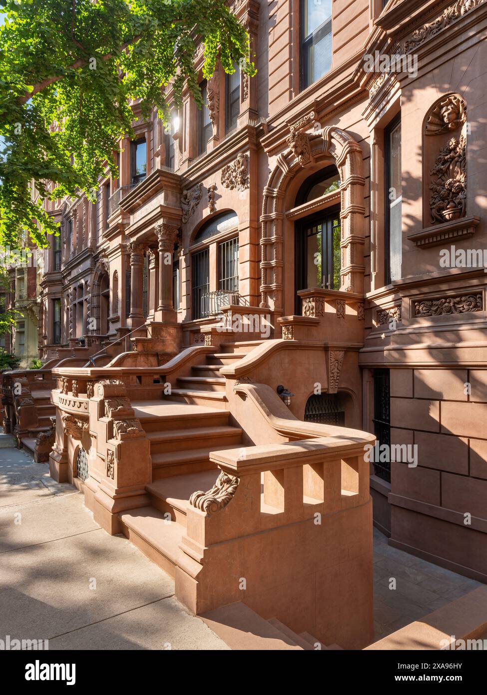 Iconic row of brownstones with stoop steps on New York City's Upper ...