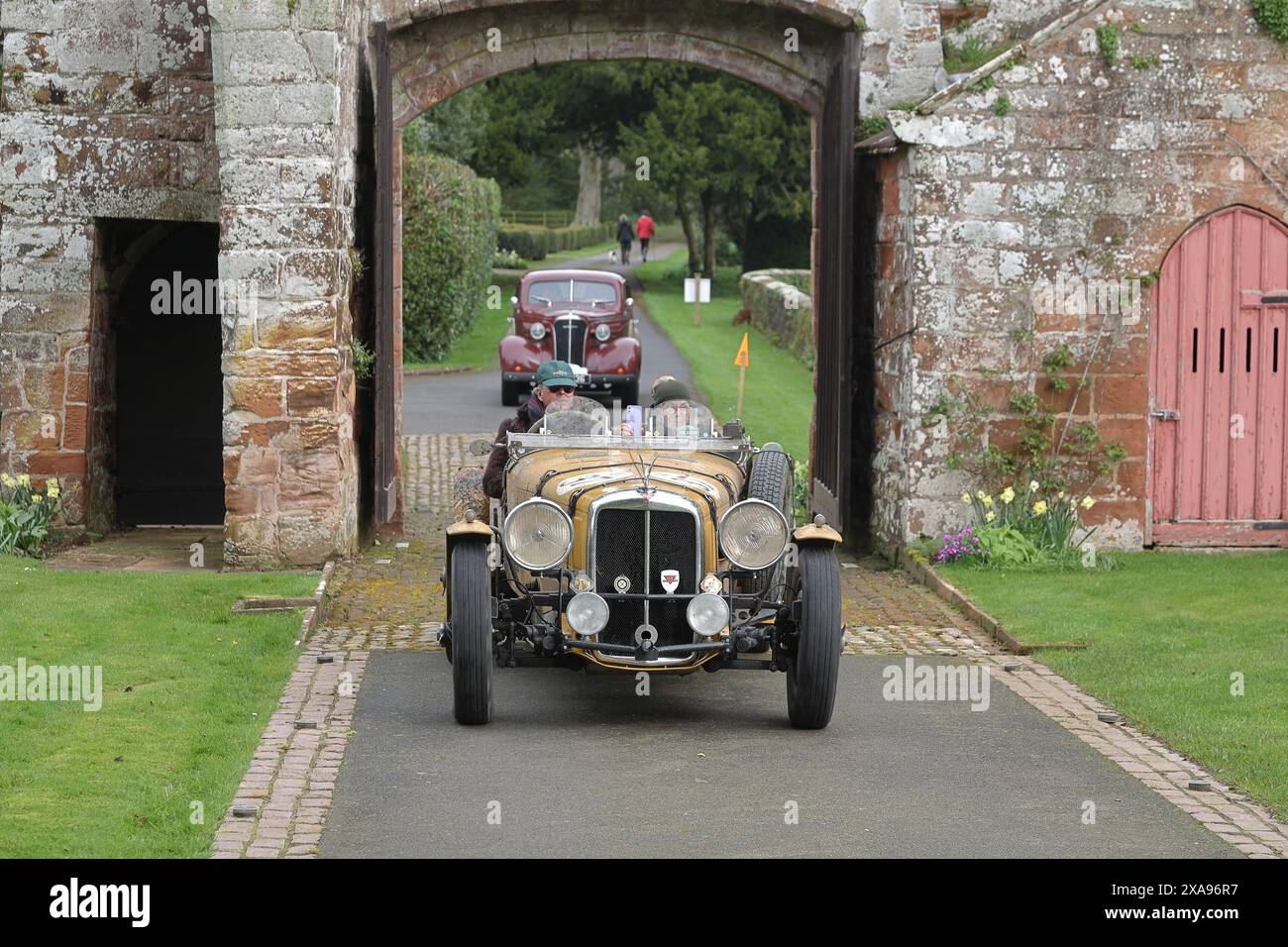 A procession of vintage cars arrive at Rose Castle in Dalston, Cumbria ...