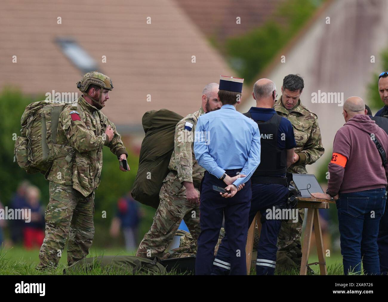Military personnel at a security checkpoint as members of the British ...