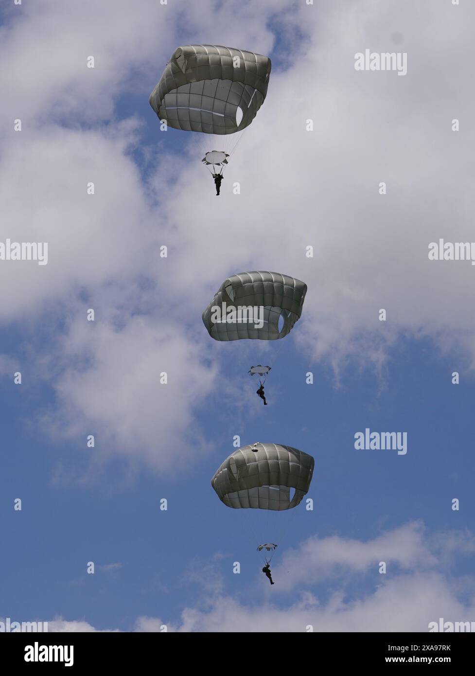 Members of the British, Belgian, Canadian and US military take part in ...