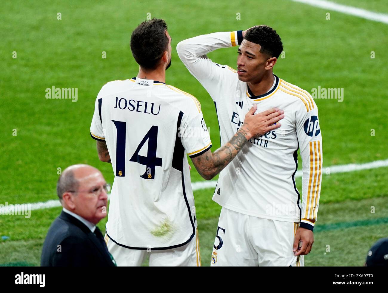 Real Madrid's Jude Bellingham (right) reacts at the end of the UEFA ...