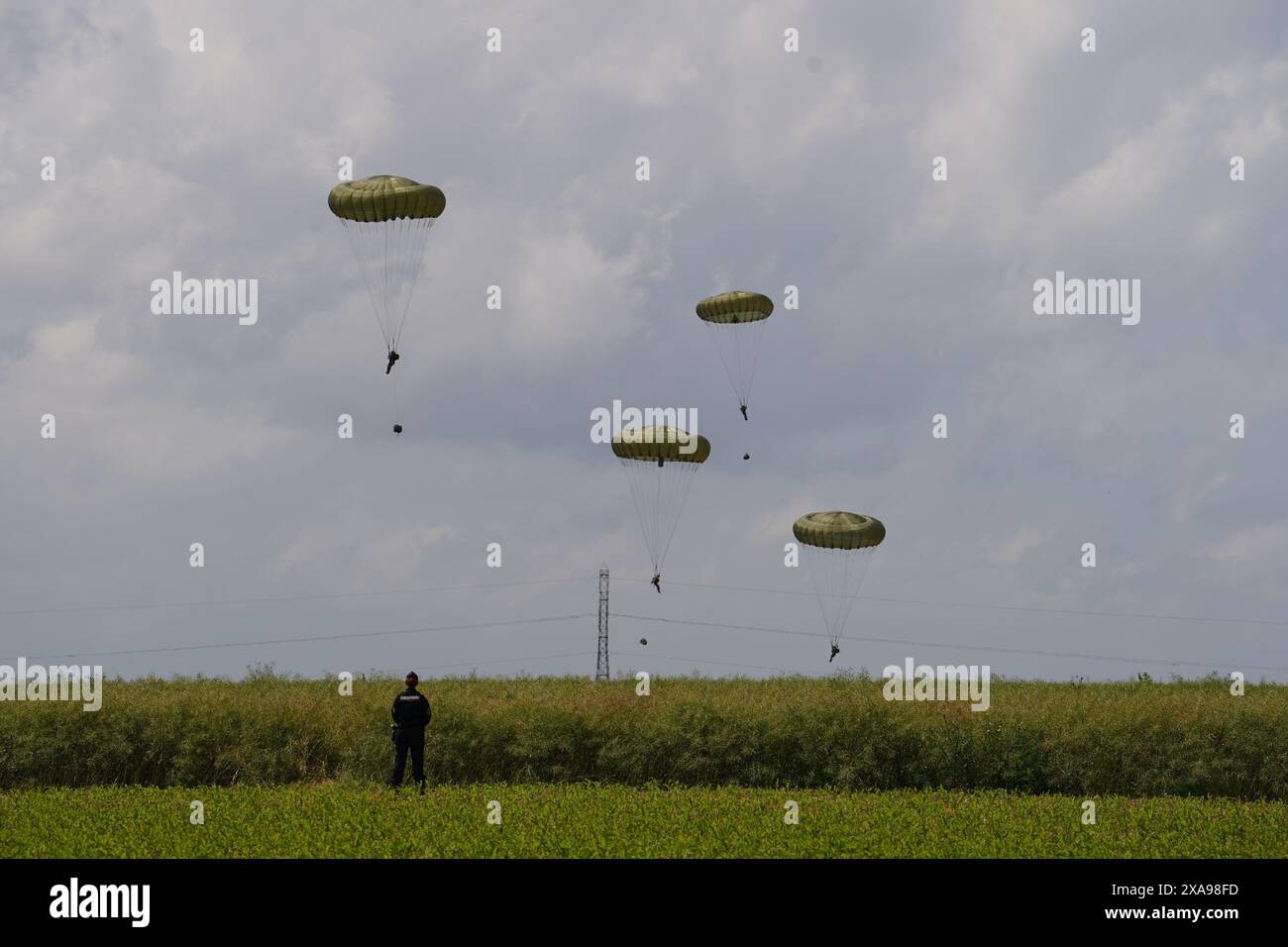 Members of the British, Belgian, Canadian and US military take part in ...