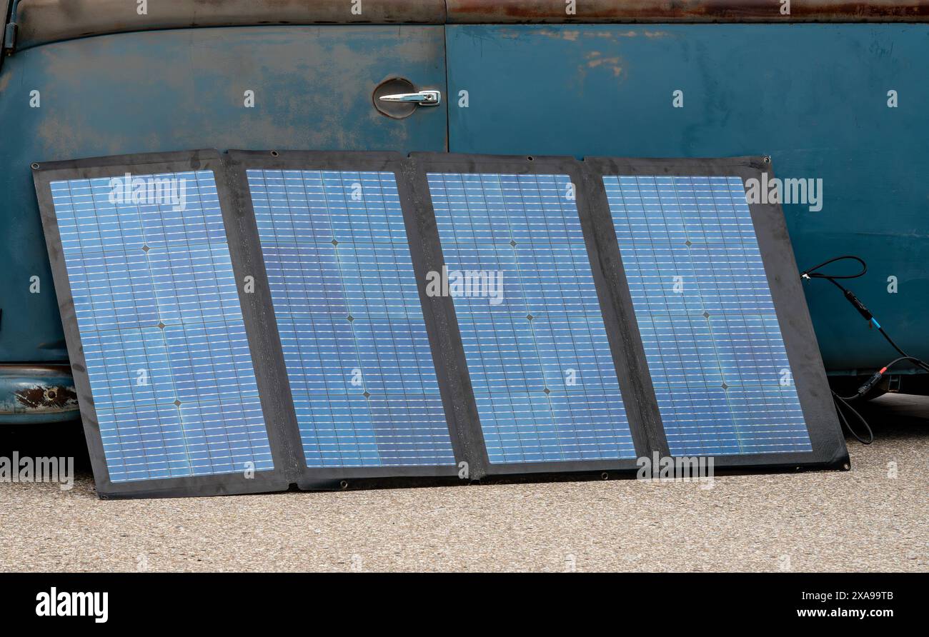 Set of portable and foldable solar panels for charging of small ...