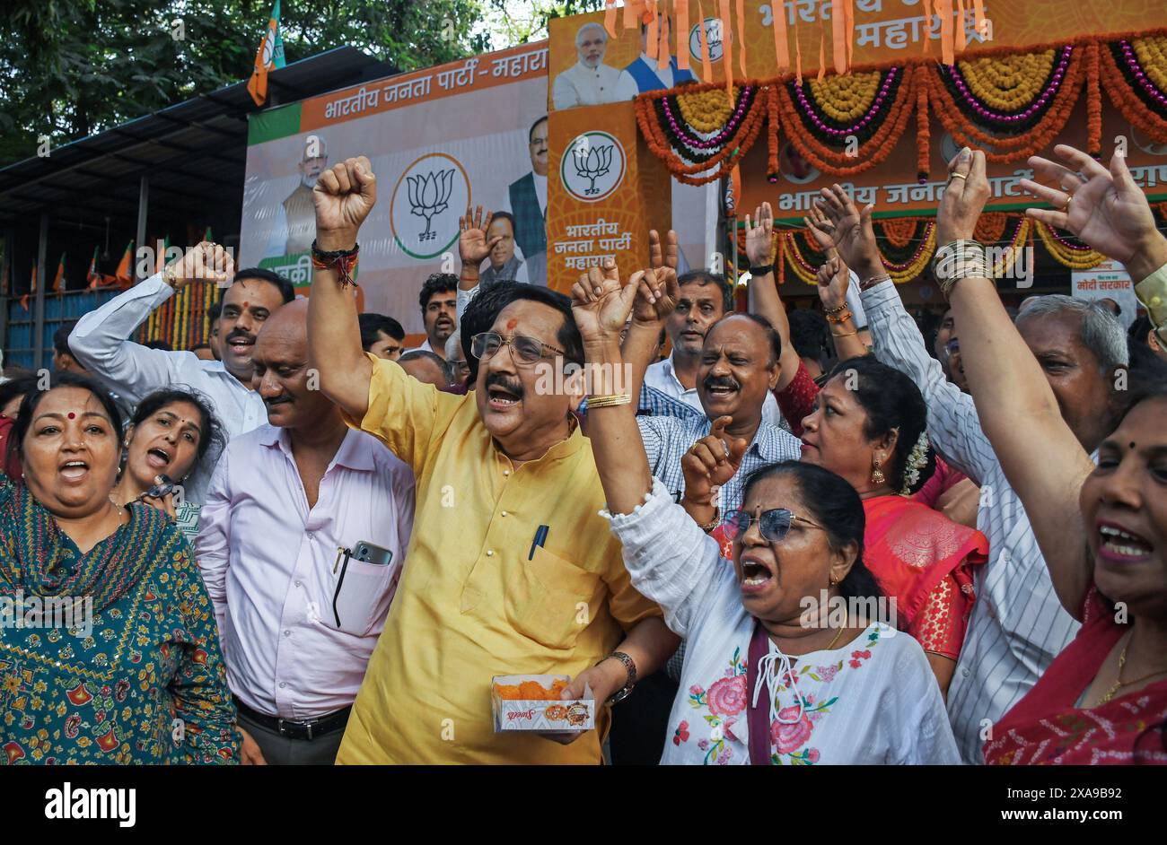 Mumbai, India. 04th June, 2024. Bharatiya Janata Party (BJP) supporters shout slogans and ...