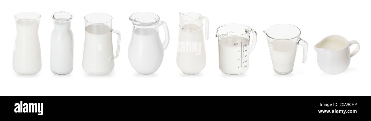 Fresh milk in jugs isolated on white, set Stock Photo - Alamy