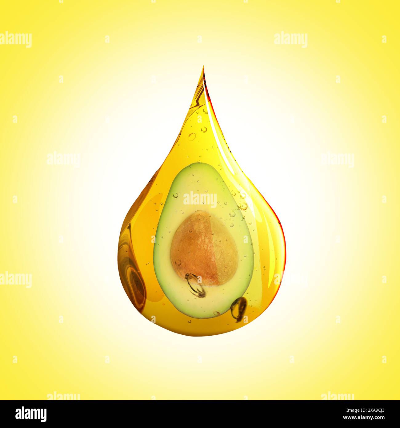 Cooking oil drop with half of avocado inside on yellow background Stock ...