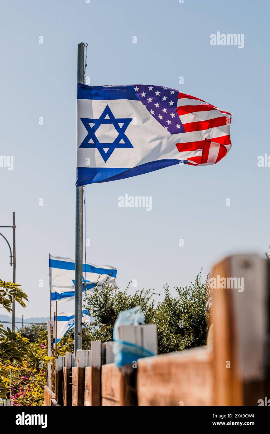 Israeli American friendship flag is flattering in the wind. Hybrid flag ...