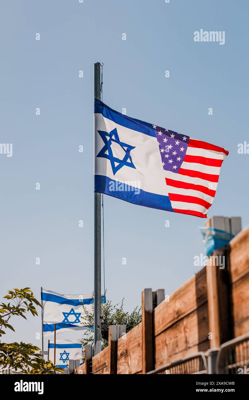 Israeli American friendship flag is flattering in the wind. Hybrid flag ...