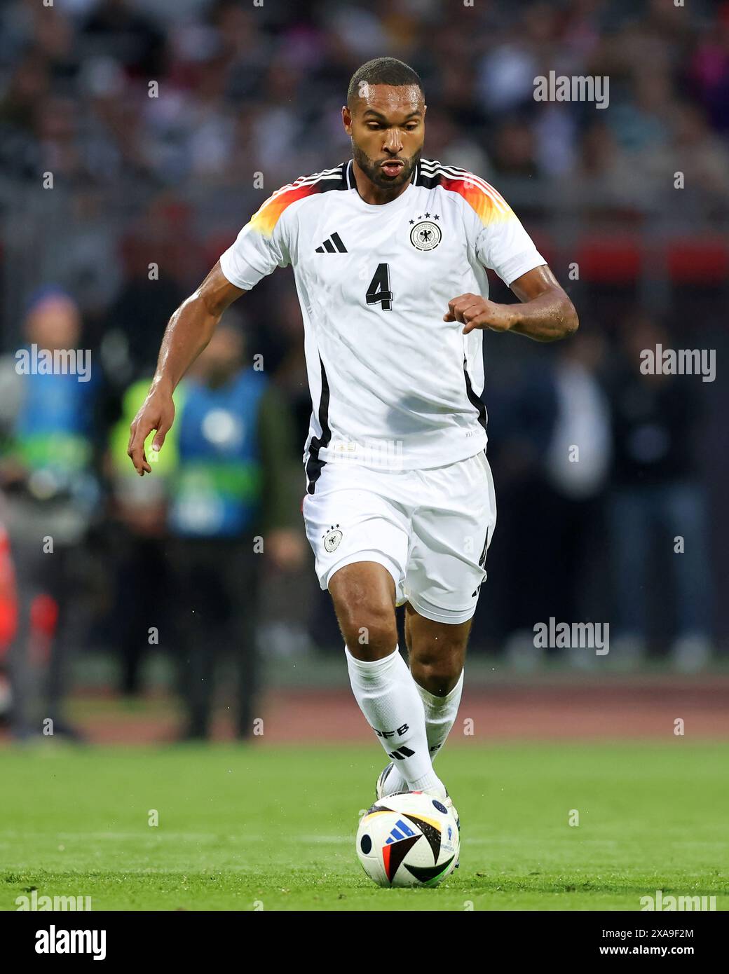 NUREMBERG, GERMANY - JUNE 03: Jonathan Tah of Germany runs with a ball ...