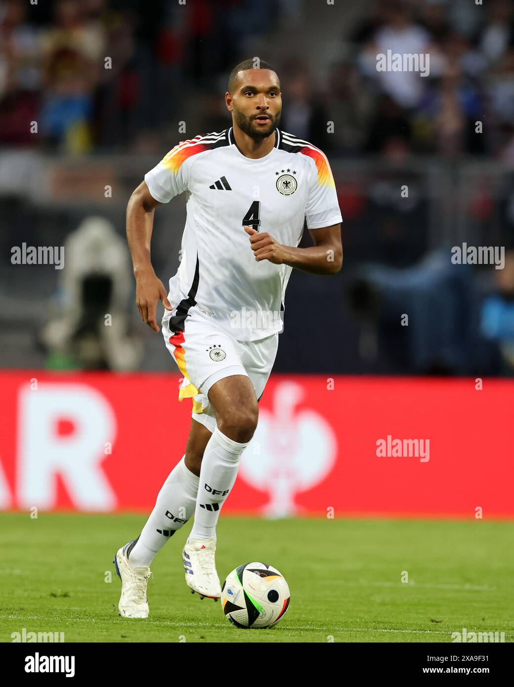 NUREMBERG, GERMANY - JUNE 03: Jonathan Tah of Germany runs with a ball ...