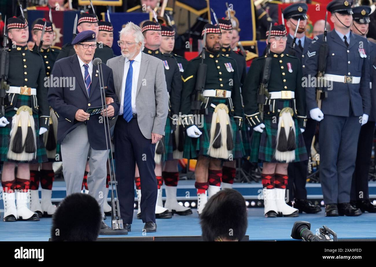 D-Day veteran Eric Bateman speaks alongside his son-in-law Keith (right ...