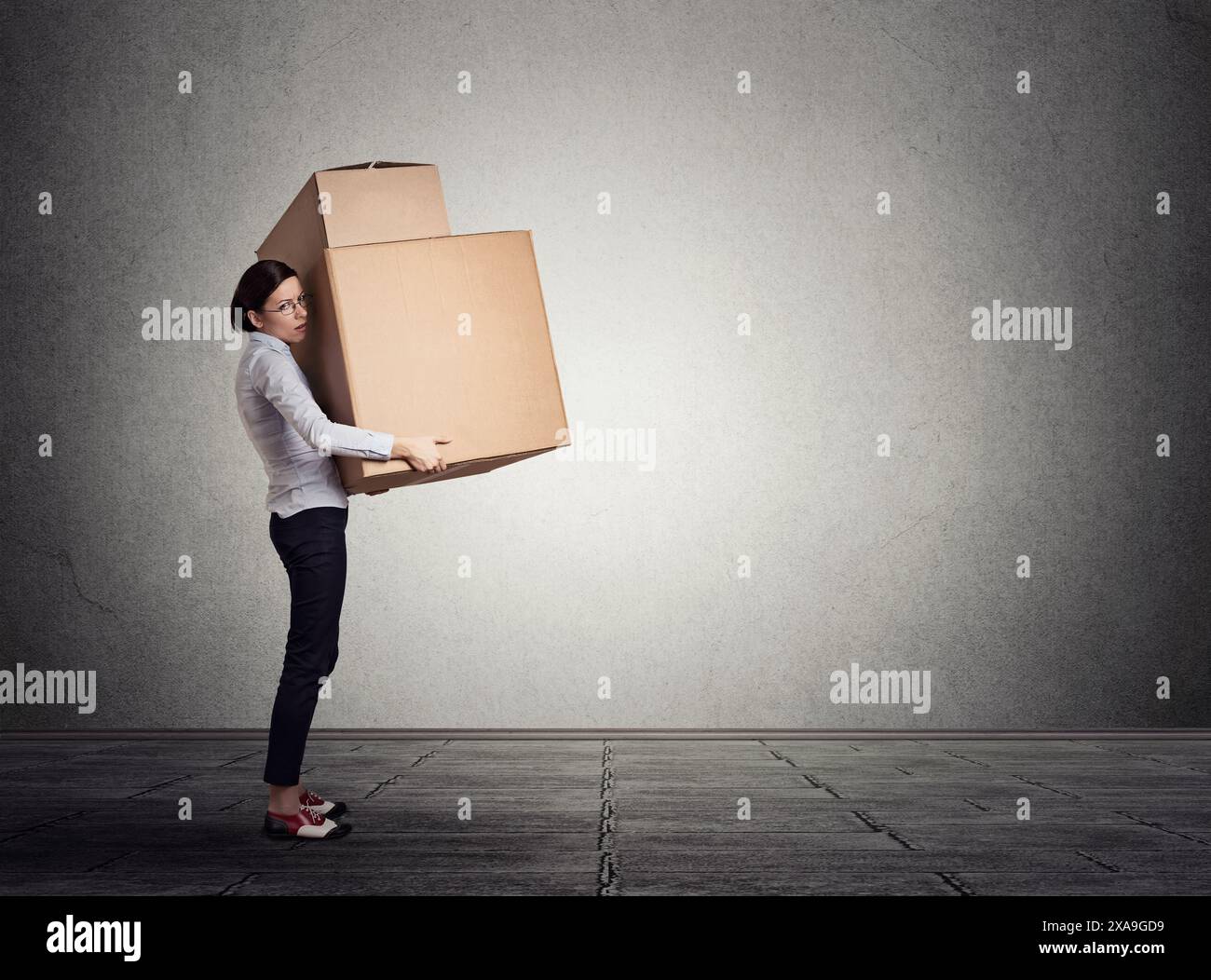 Woman carrying big gift box hi-res stock photography and images - Alamy