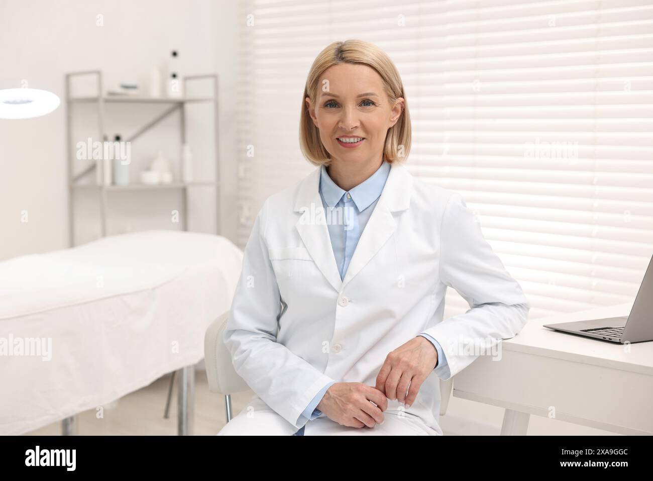 Portrait of happy dermatologist in modern clinic Stock Photo - Alamy