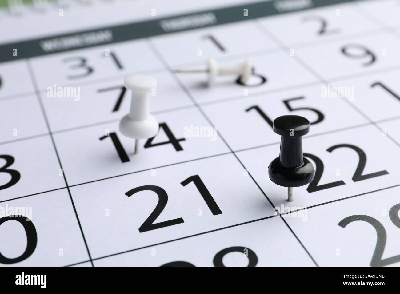 Timetable. Calendar with drawing pins, closeup view Stock Photo - Alamy