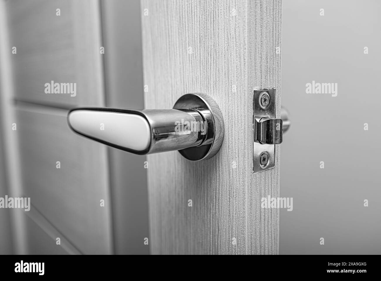 Handle and lock of an interior door Stock Photo - Alamy