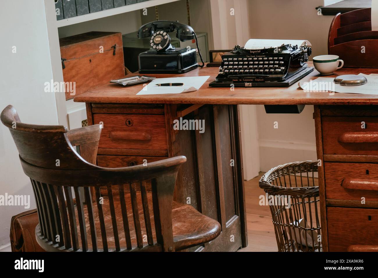 Vintage old historic vintage office interior with old desk, typewriter ...