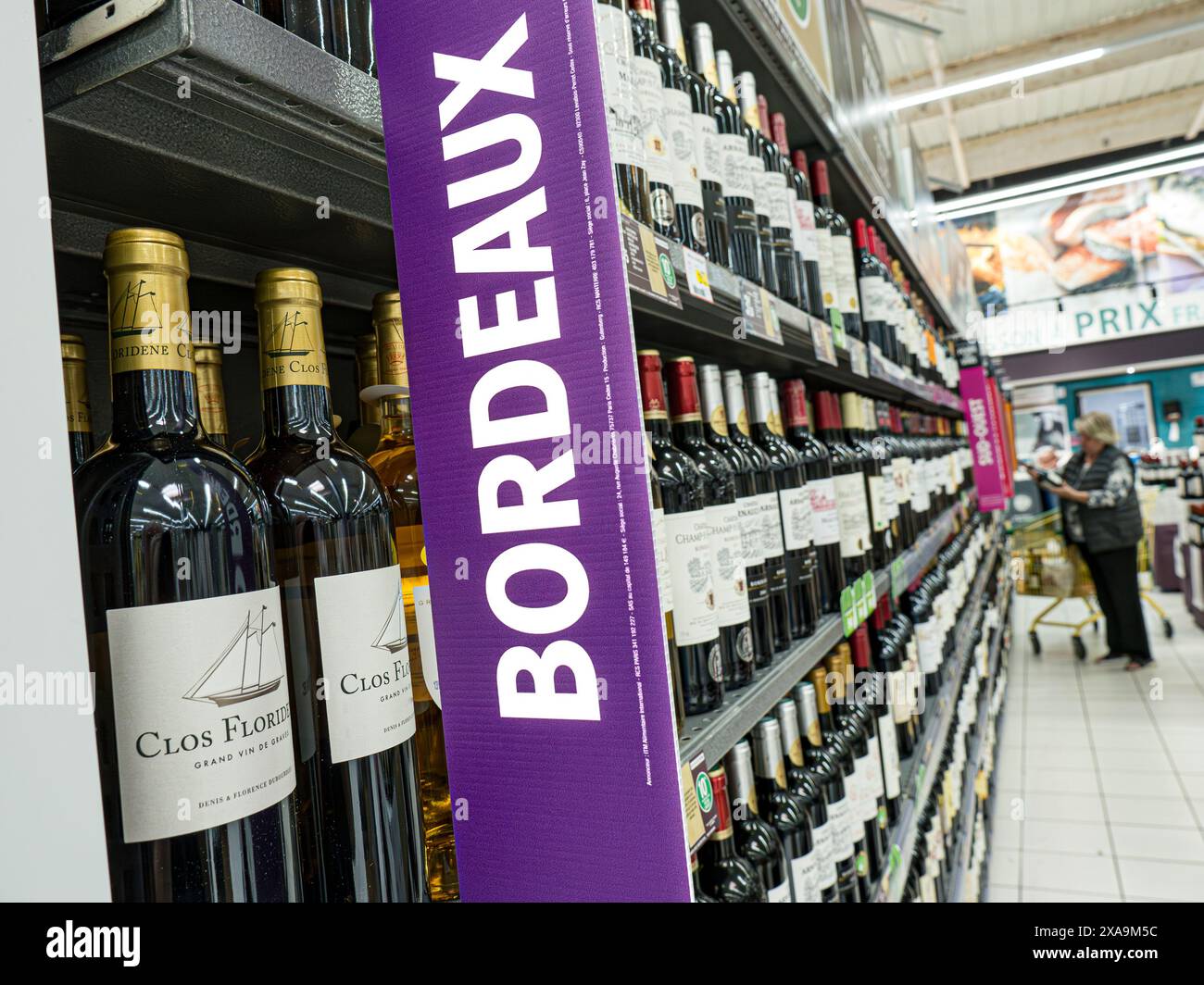 French supermarket wine aisle promoting Bordeaux sign banner bottles ...
