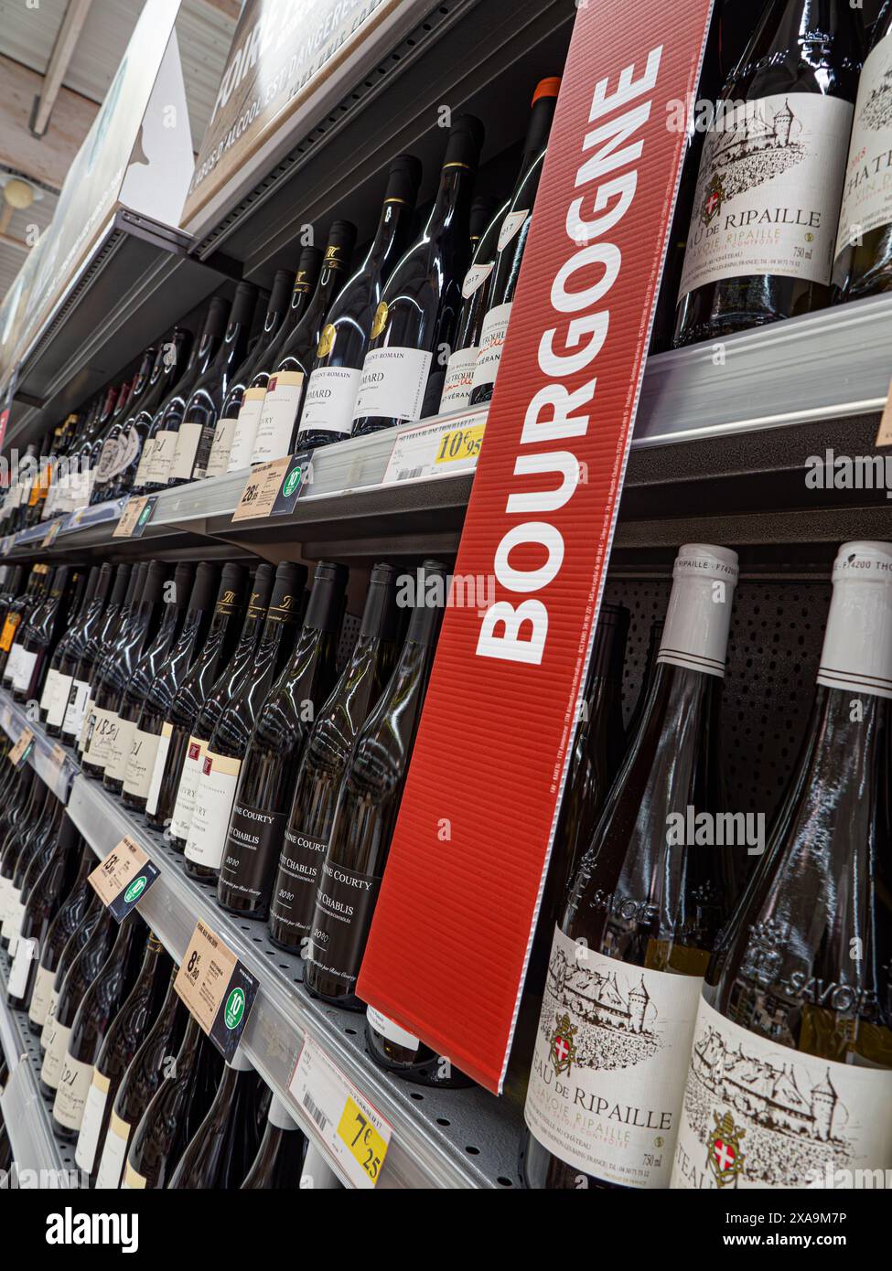 French supermarket Burgundy wine varieties on display, banner sign ...