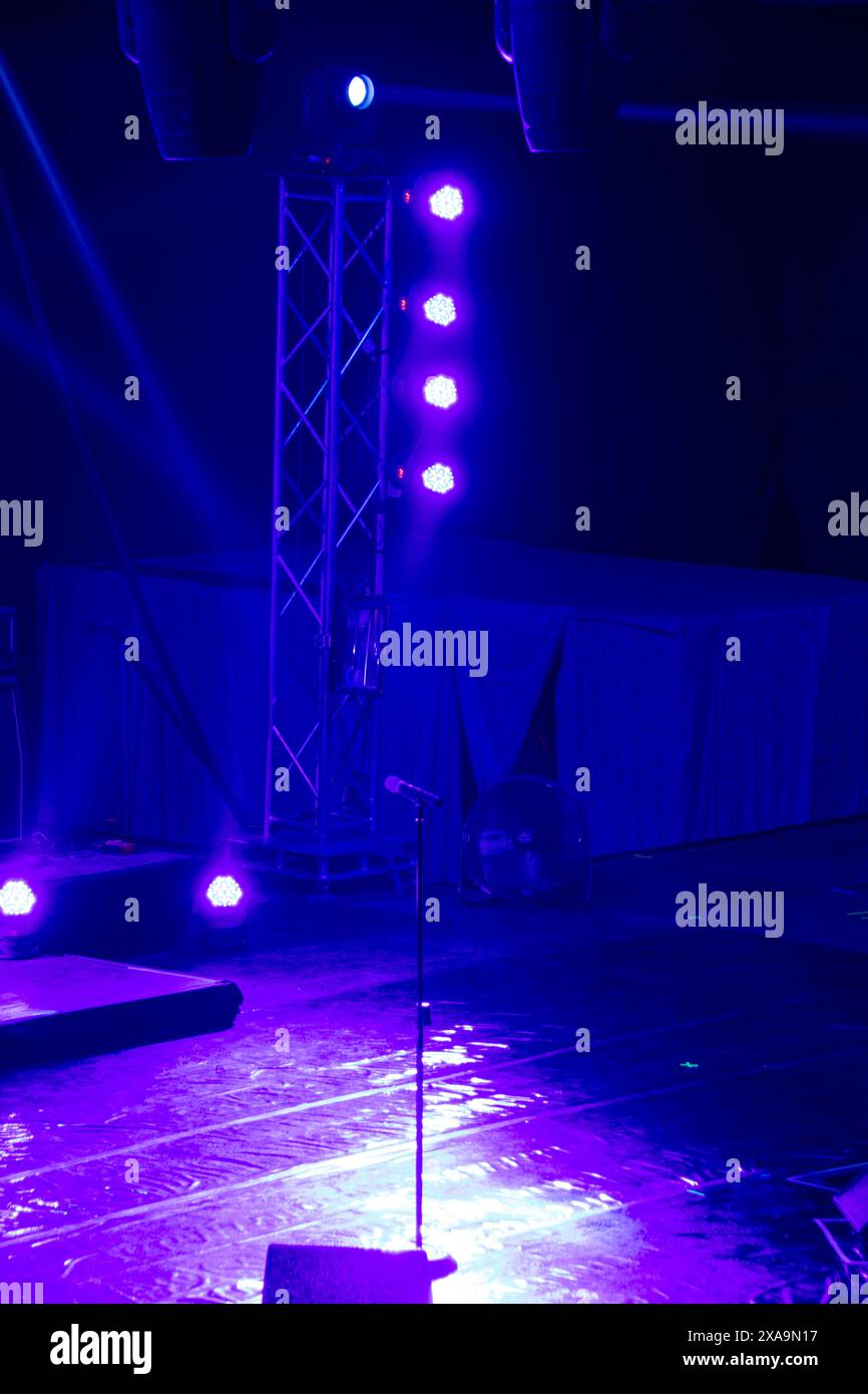 concert lights, illuminated stage in interior space, artificial ...