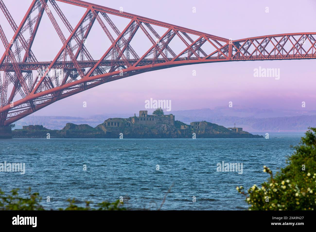 The island of Inchgarvie and its ruins of a castle and fort are seen ...
