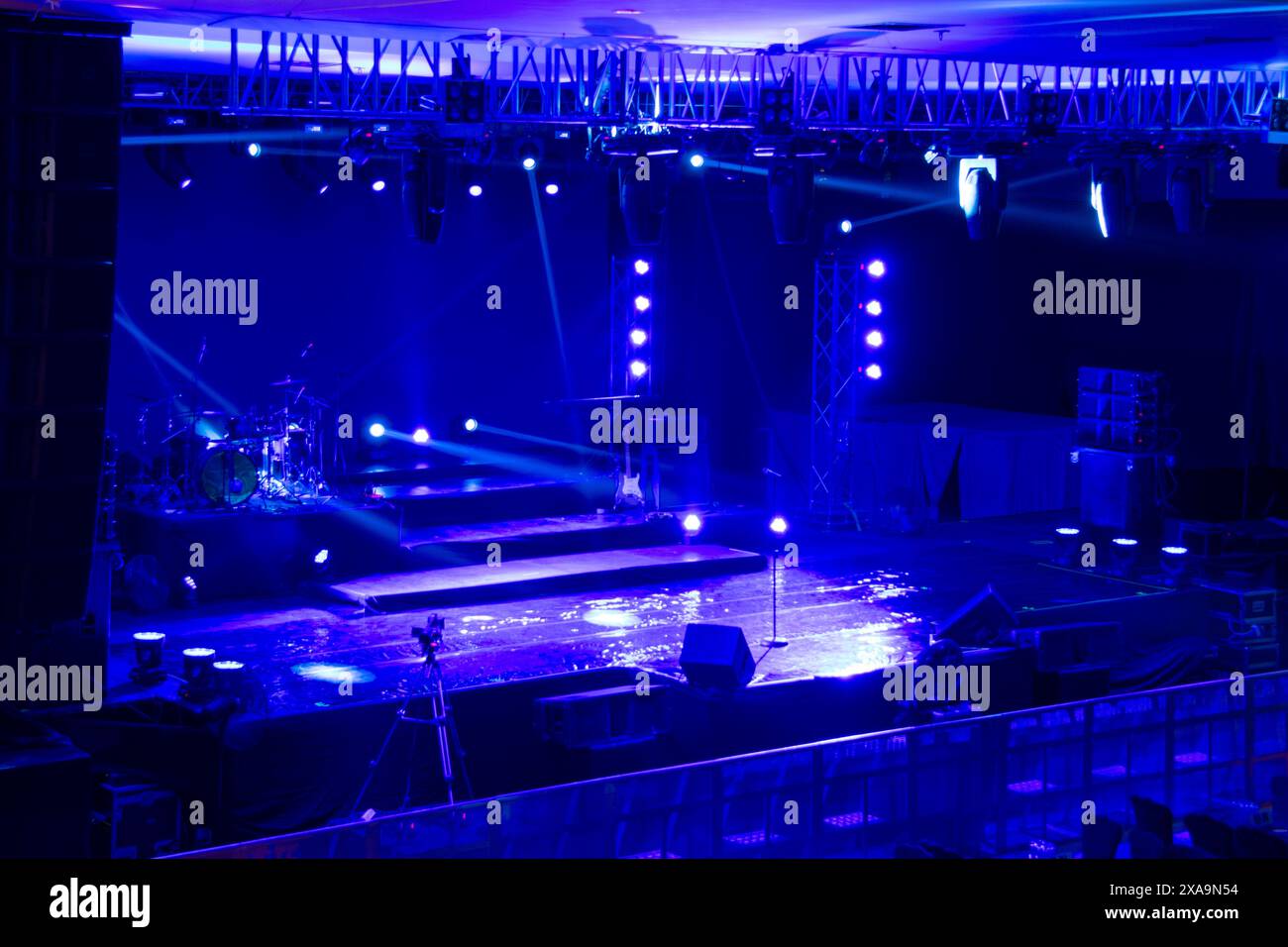 concert lights, illuminated stage in interior space, artificial ...
