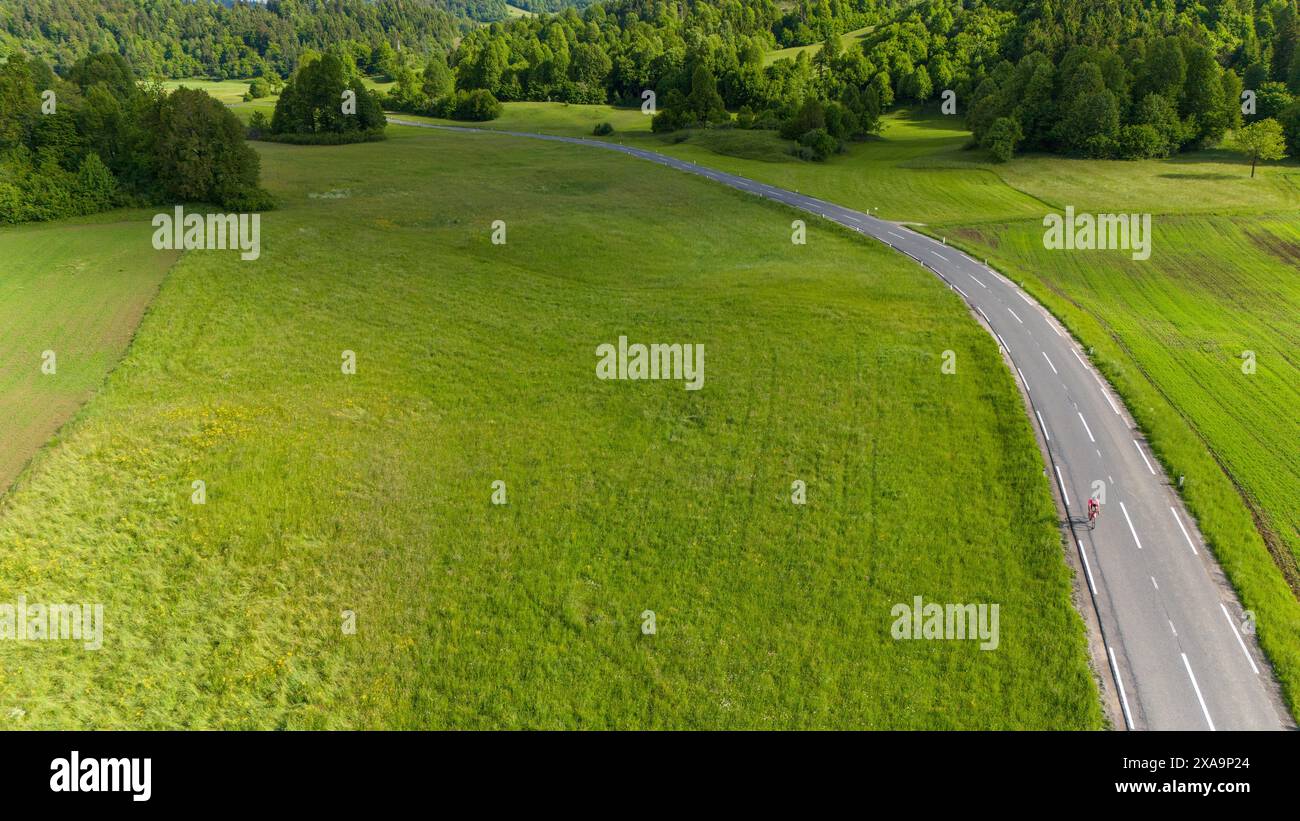 Aerial view person riding bicycle hi-res stock photography and images ...