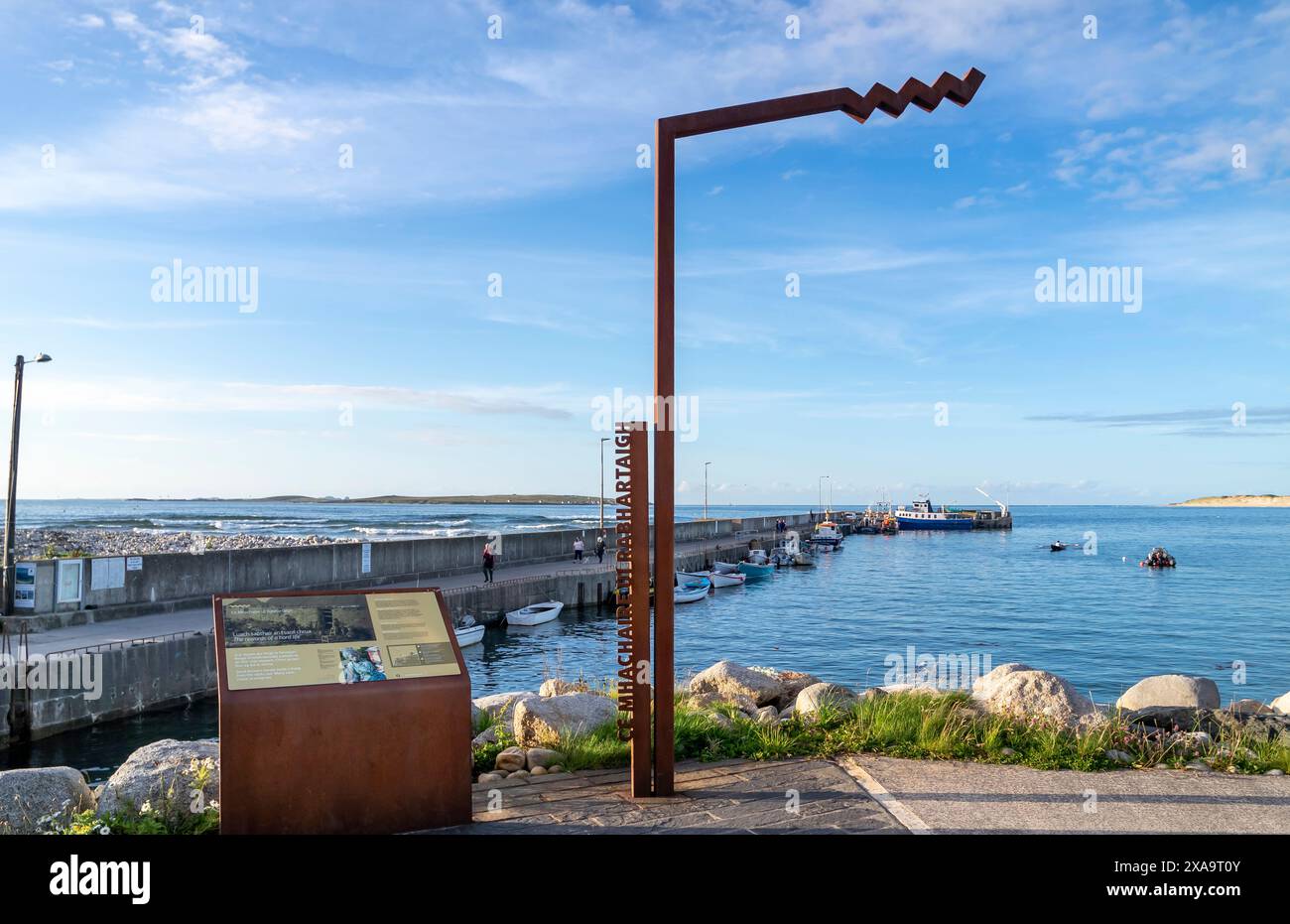 MAGHEROARTY, IRELAND - JULY 31 2022: Sign explaining in Irish ...