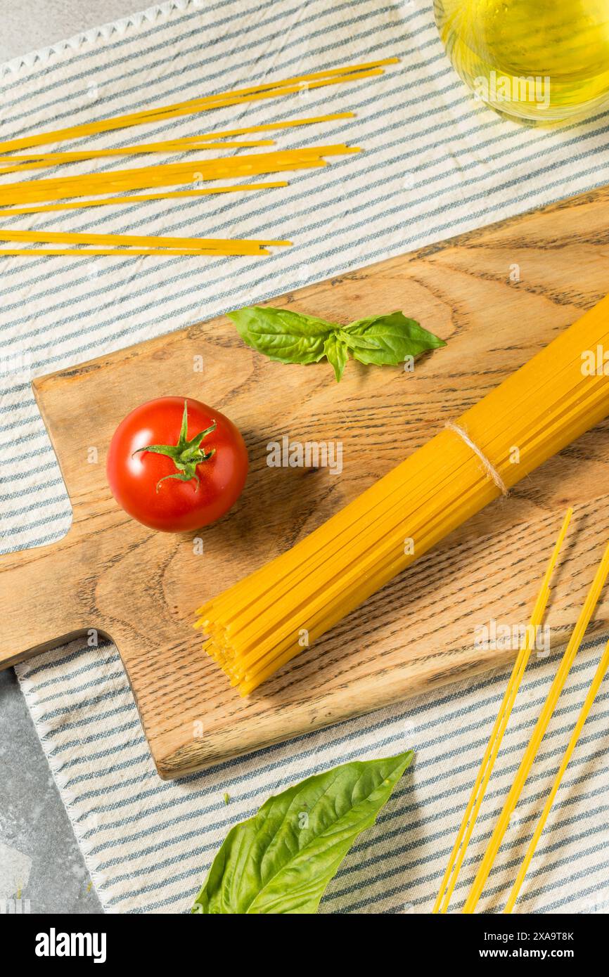 Dry Raw Yellow Italian Spaghetti in a Bundle Stock Photo - Alamy